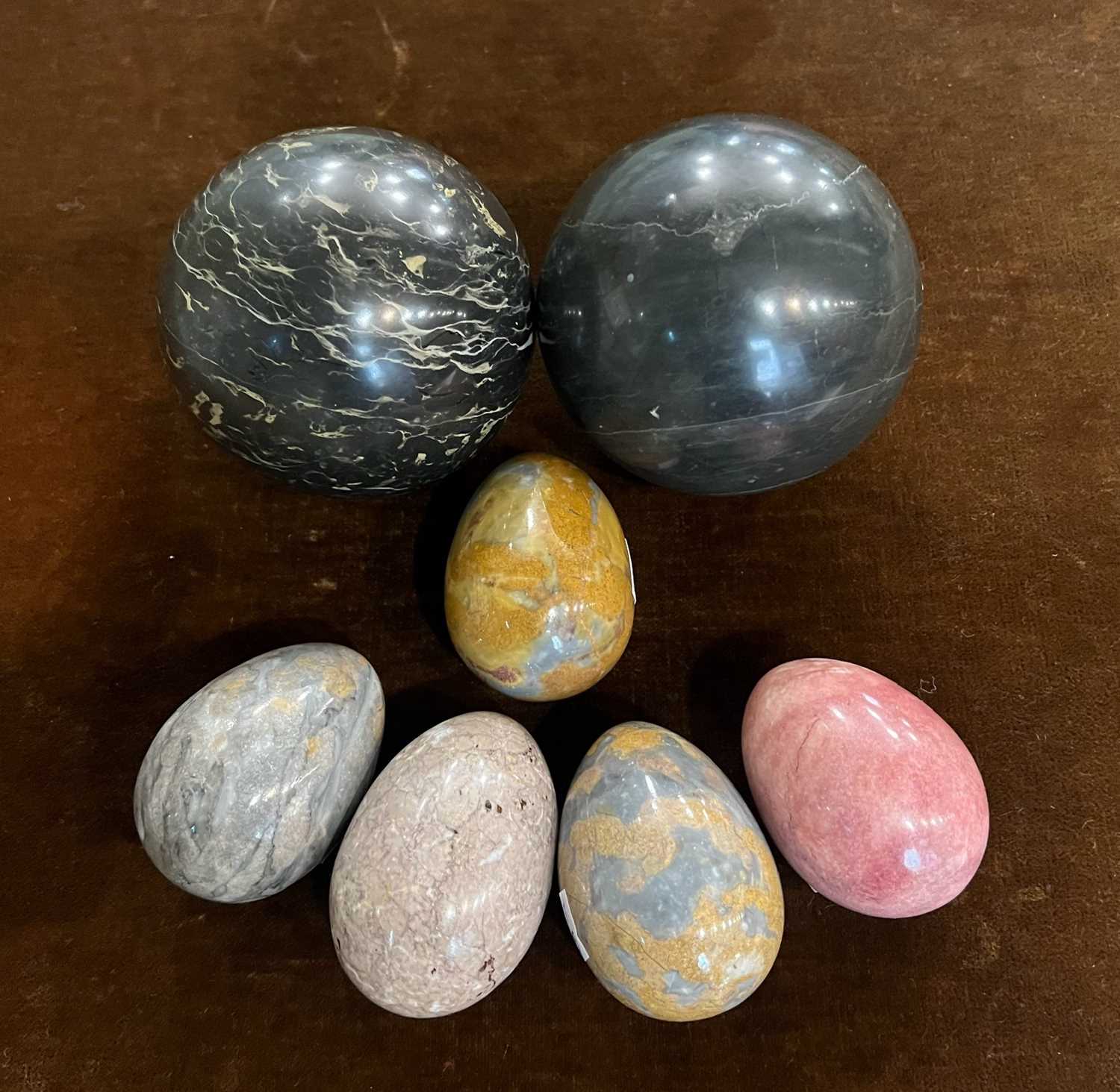 Lot 496 - Two circular polished stone balls, together