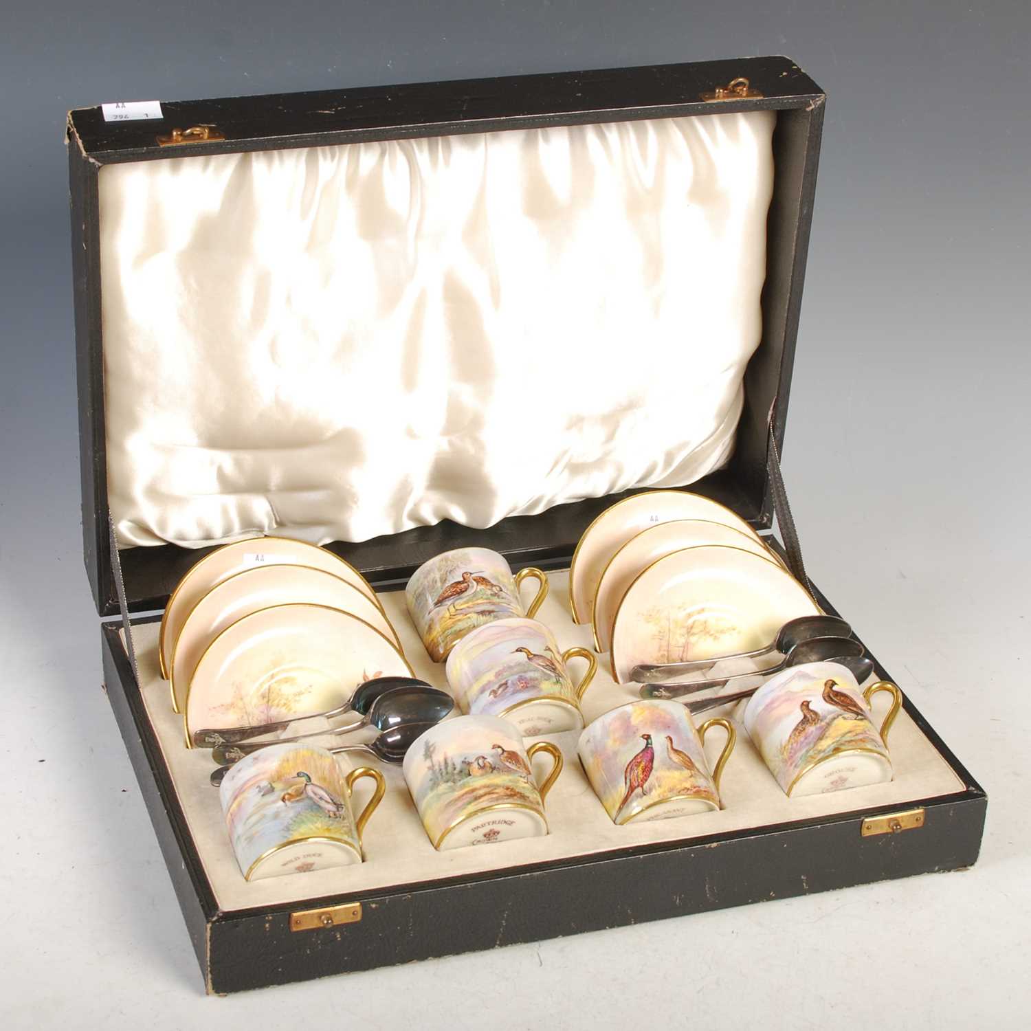 Lot 193 - A cased Crown Devon gamebird pattern coffee