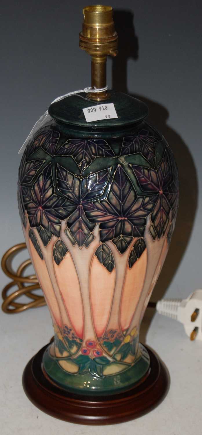 Lot 201 - A Moorcroft pottery table lamp and shade,