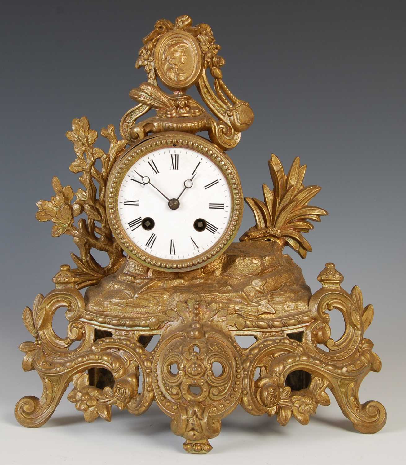 Lot 197 - A late 19th century gilt metal mantle clock,
