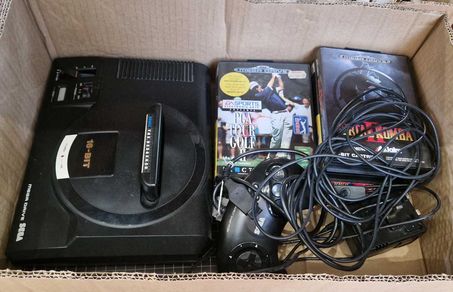 Lot 584 - A Sega Mega Drive, controller, and selection