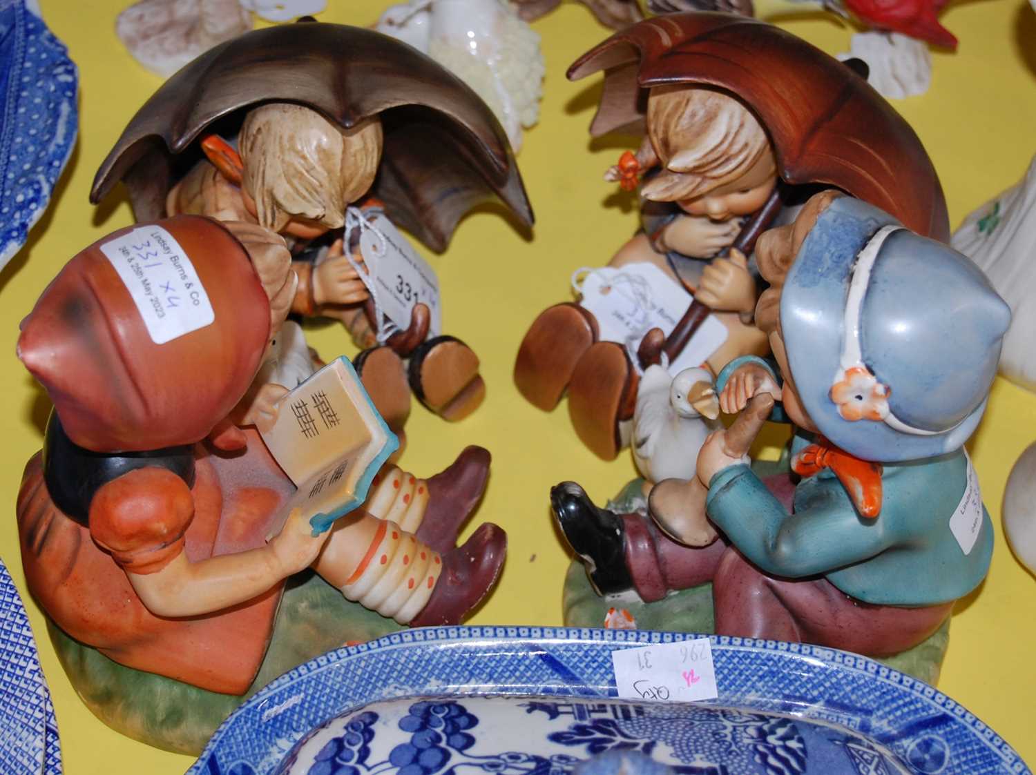Lot 331 - A pair of Goebel ceramic figures, boy and