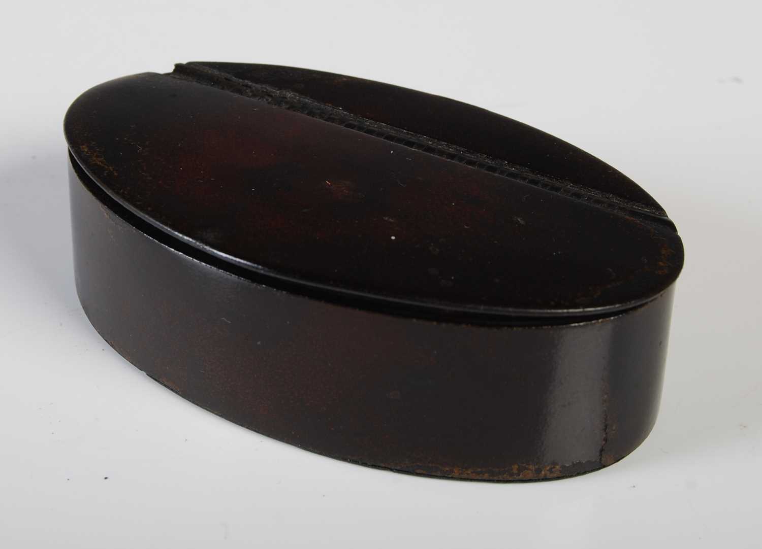 Lot 287 - A leather oval snuff box, with three-quarter