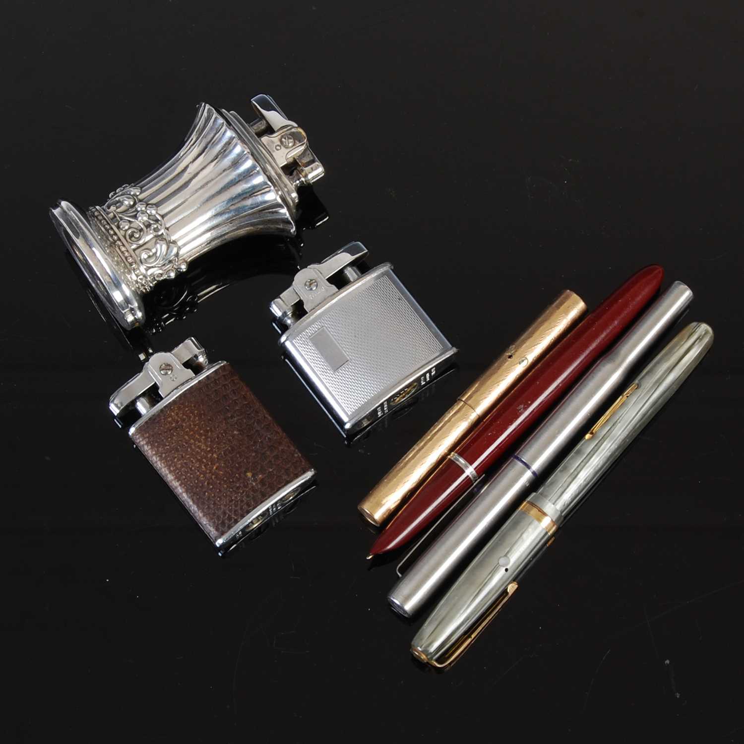 Lot 241 - Three assorted Ronson lighters; together