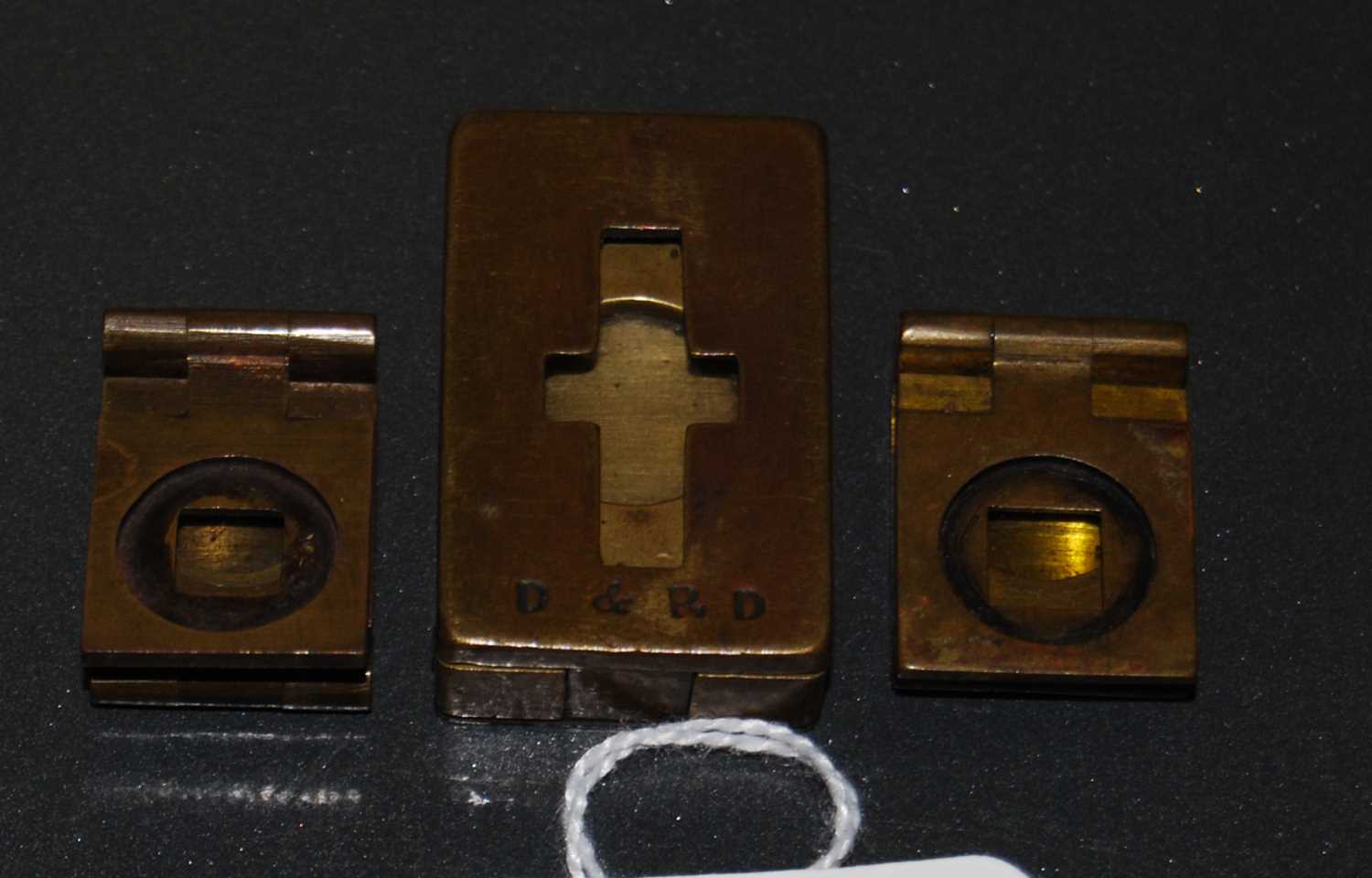 Lot 80 - Three vintage brass folding linen thread