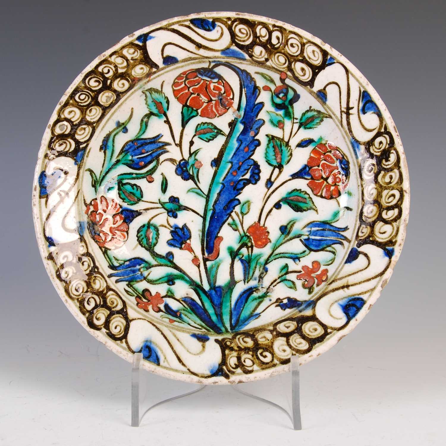 Lot 873 - A Turkish Iznik pottery dish, 17th century,