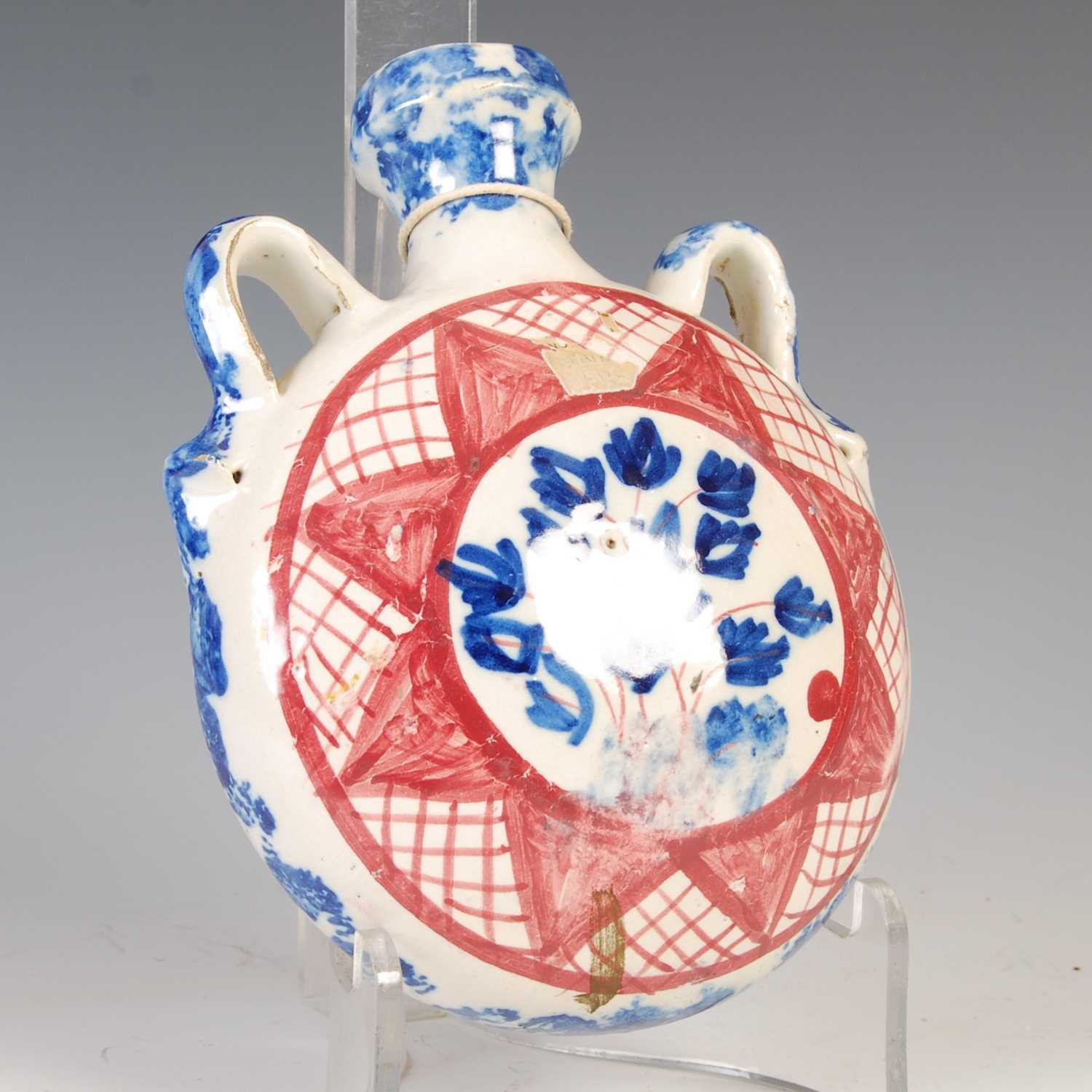 Lot 907 - A Spanish pottery two handled pilgrim flask,