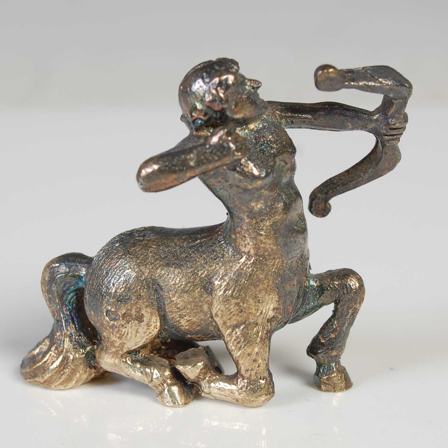 Lot 159 - Stuart Devlin, a silver gilt Zodiac model of