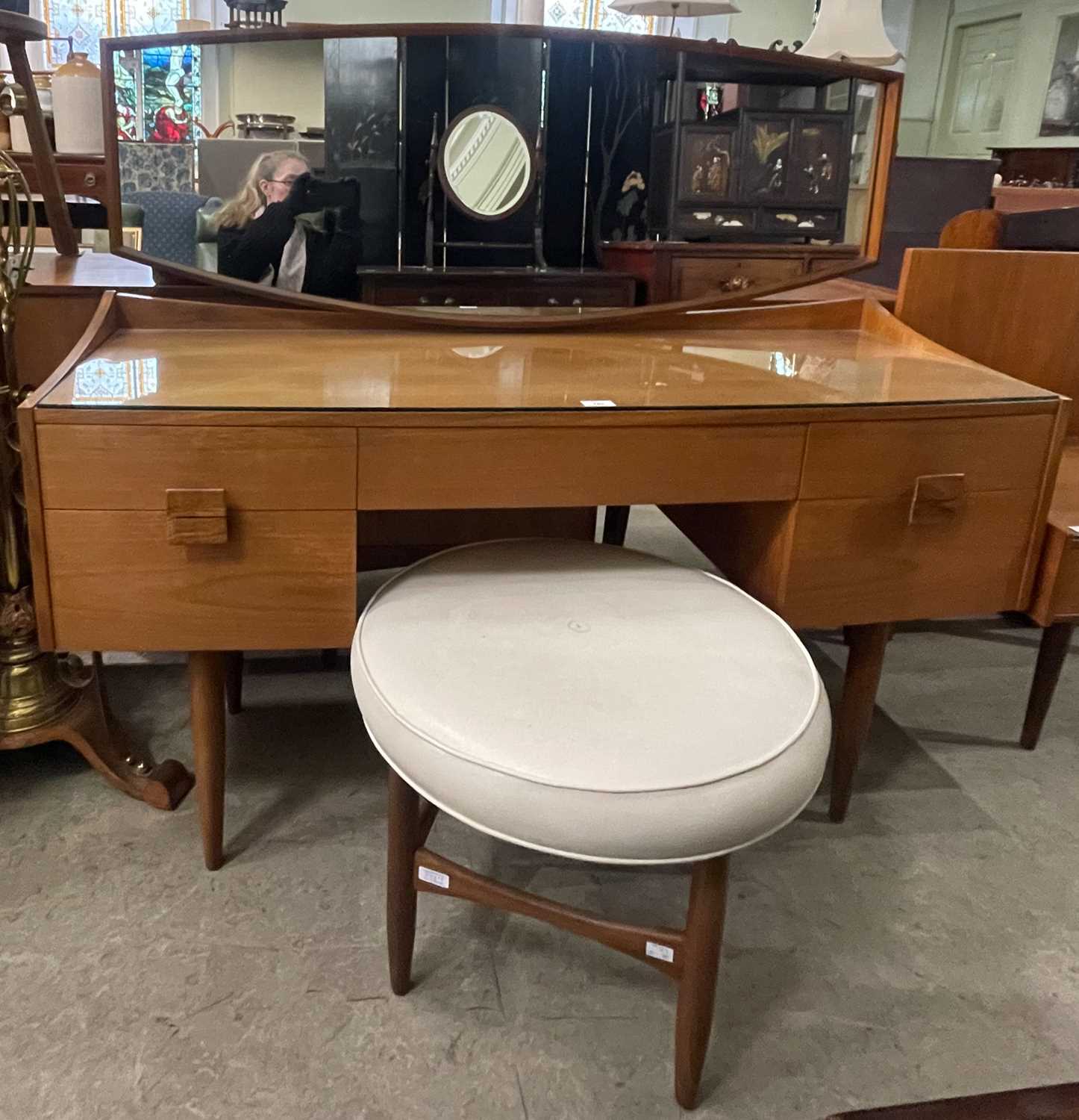 Lot 782 - A vintage G-Plan mirror back dressing table,