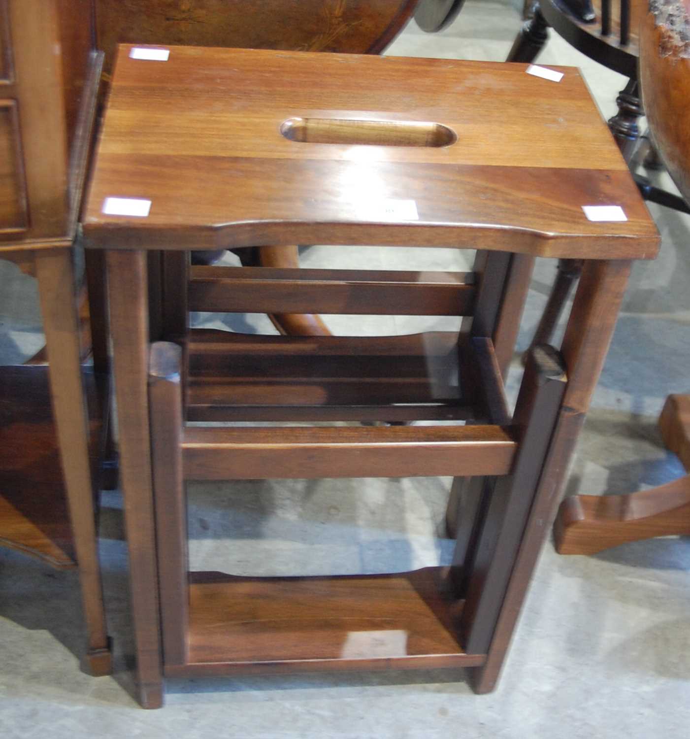 Lot 786 - A stained wood metamorphic stool/ step,