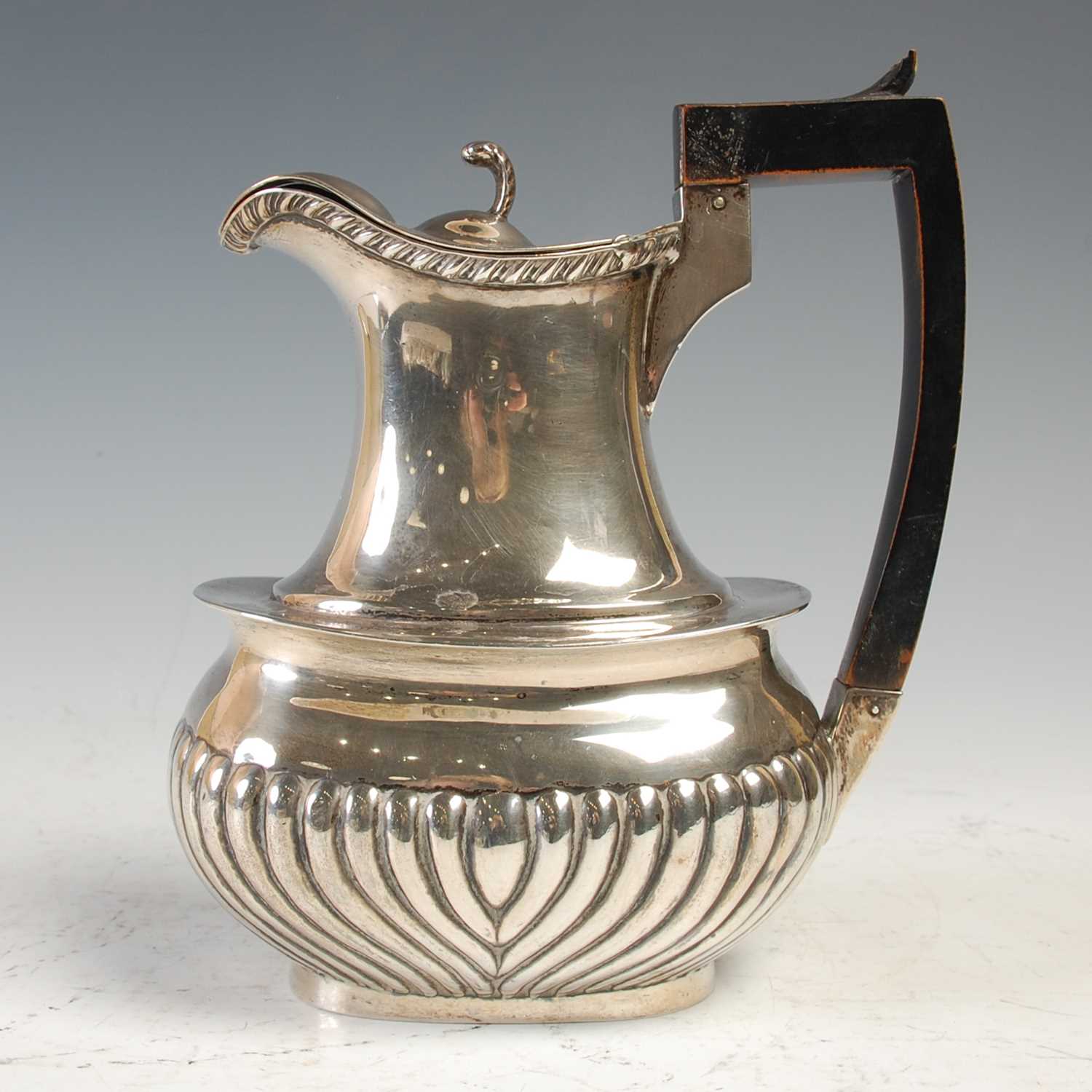 Lot 503 - A Birmingham silver hot water pot, with part