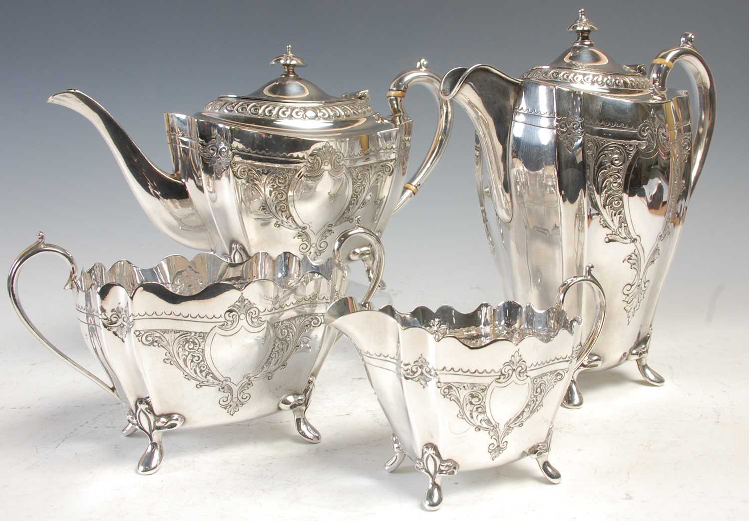 Lot 521 - A late Victorian four piece EPNS tea set,