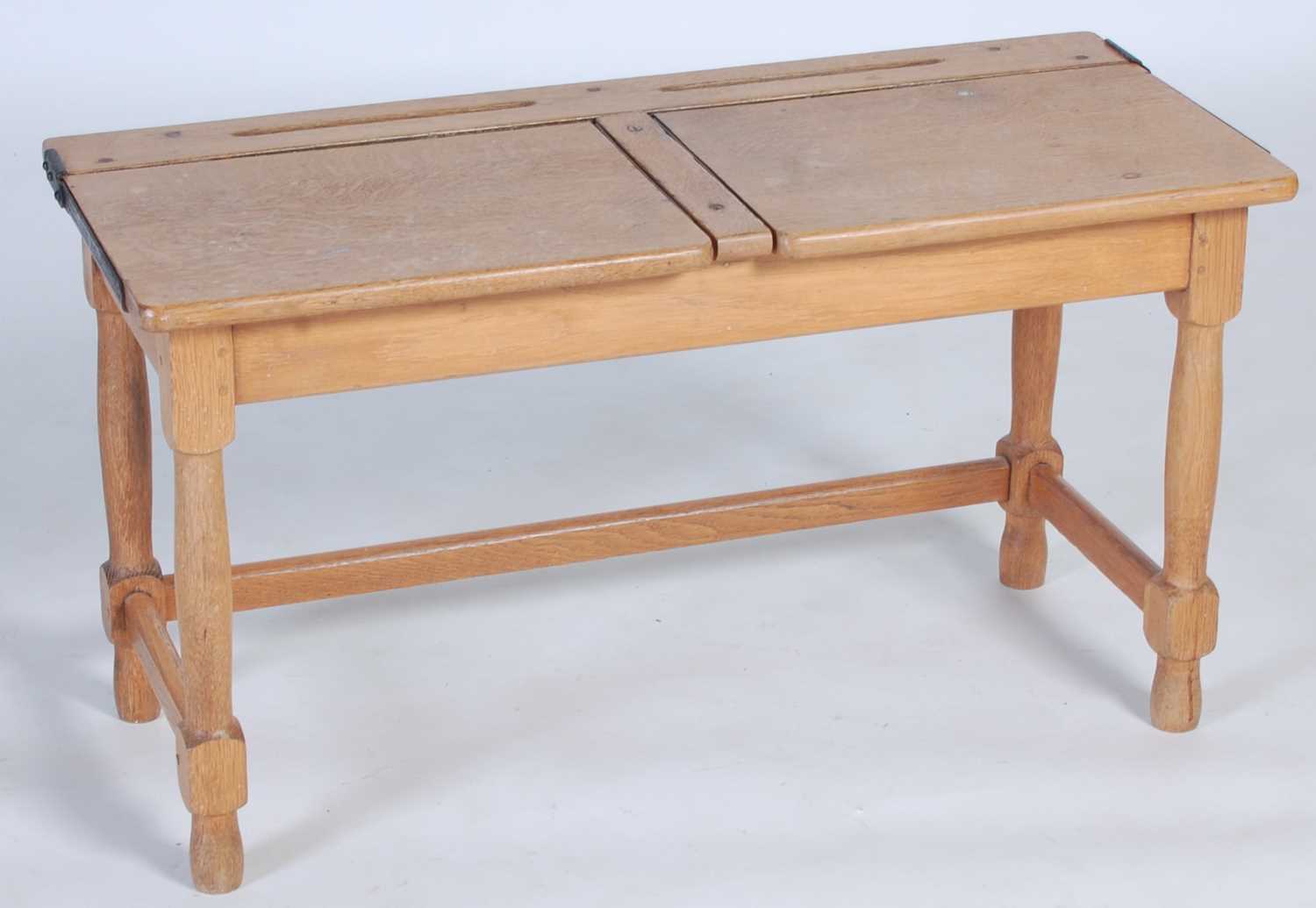 Lot 138 - A vintage oak childs school desk, the