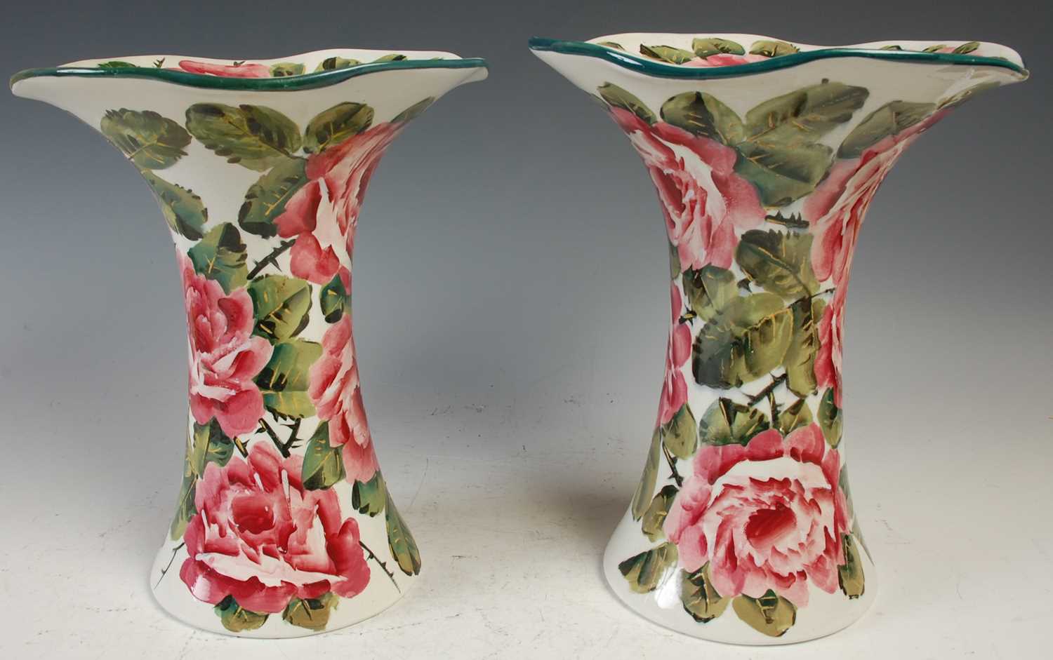 Lot 757 - A pair of Wemyss pottery Lady Eva vases,