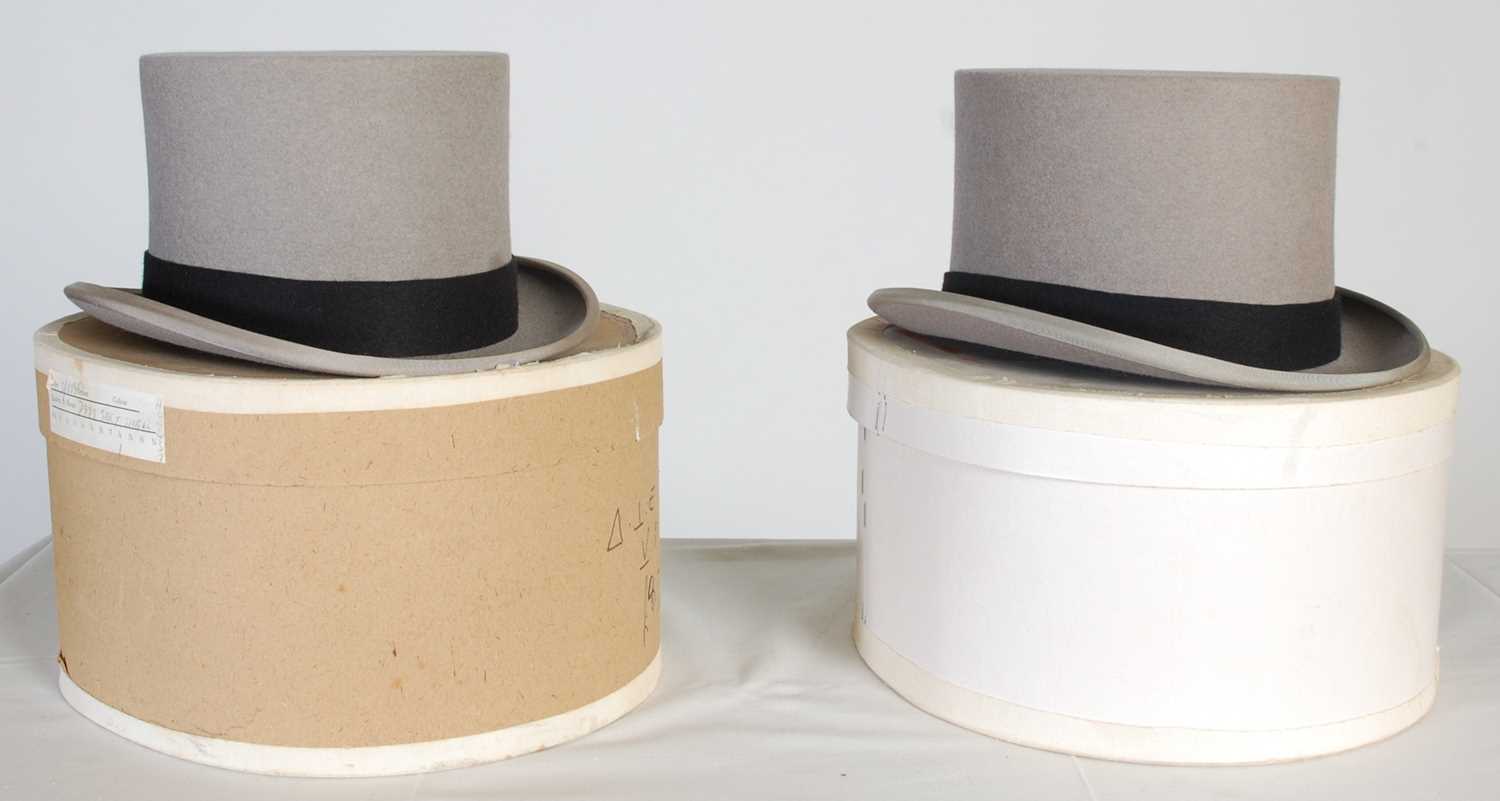 Lot 225 - Two vintage grey coloured top hats, one by