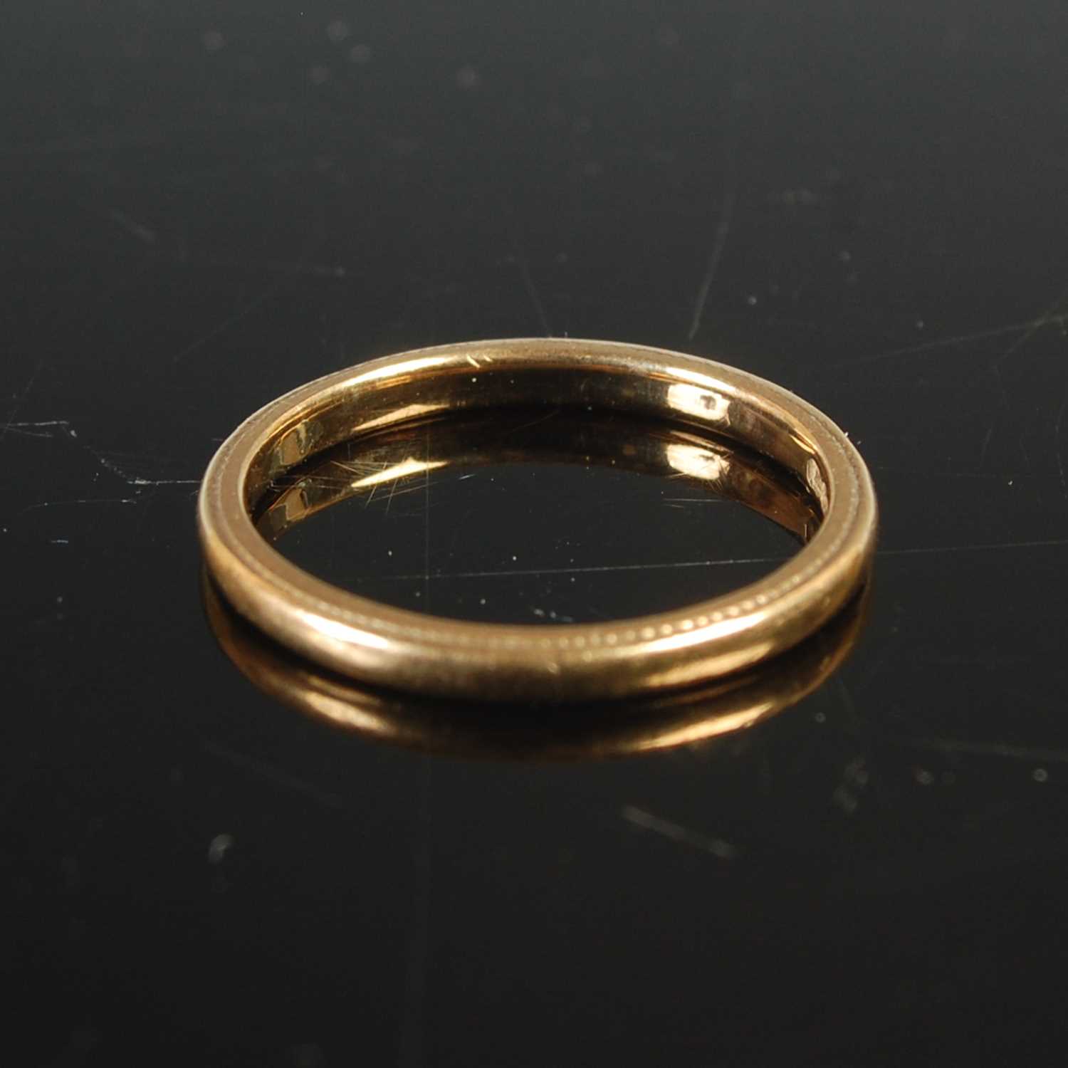 Lot 609 - A 9ct gold wedding ring, size N, 1.8 grams.