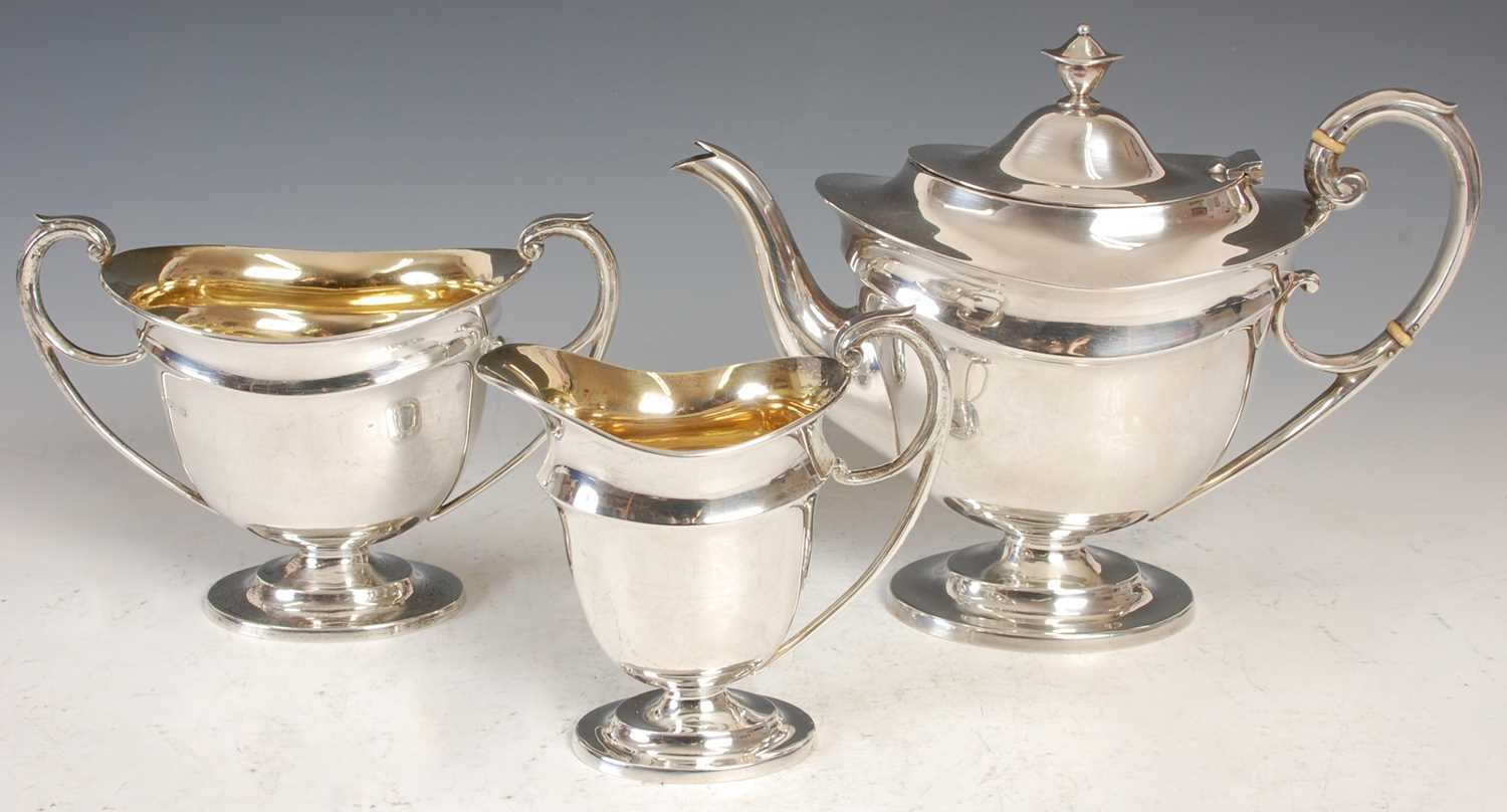 Lot 474 - An Edwardian silver three piece tea set,