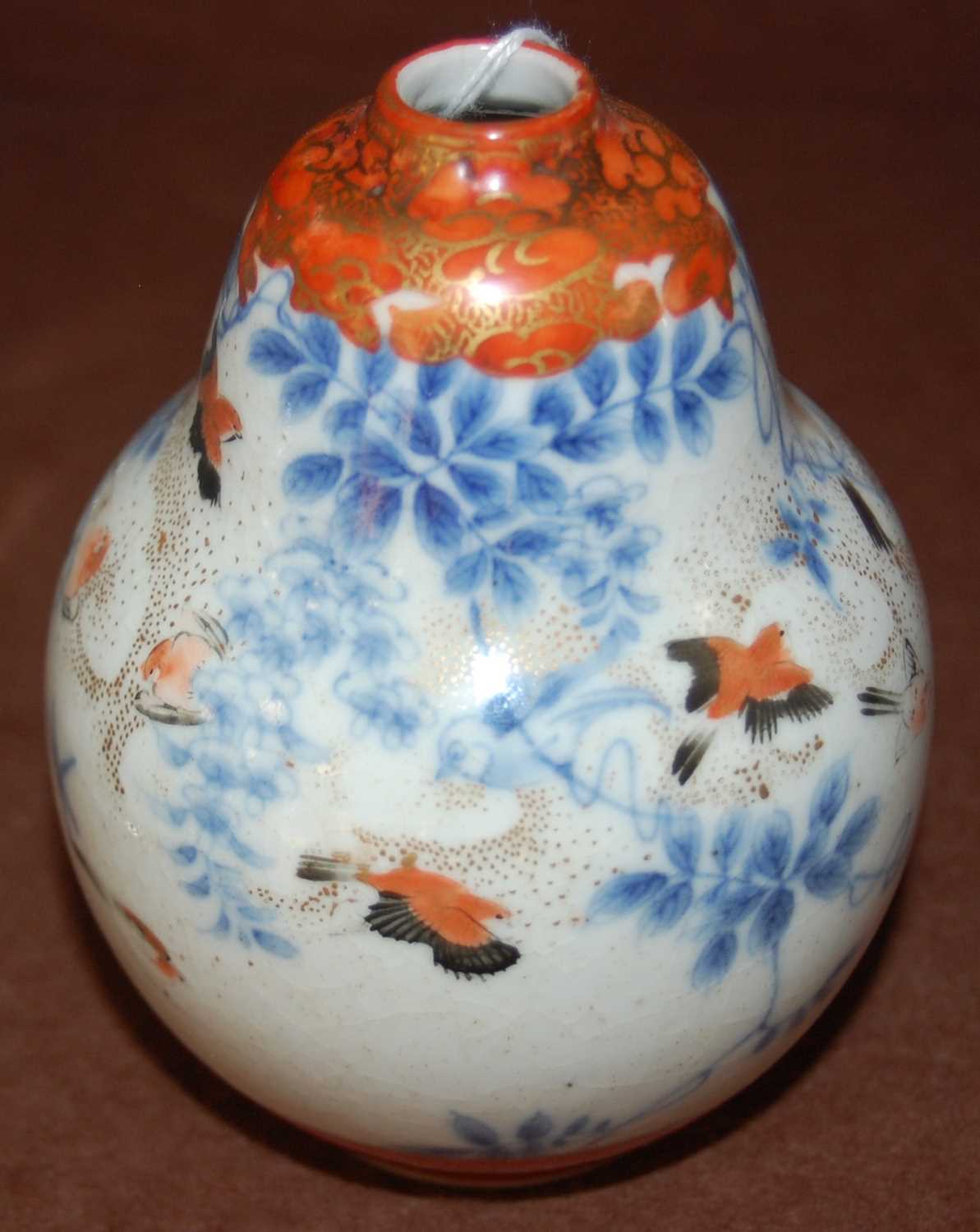 Lot 19 - A Japanese Kutani porcelain gourd vase, late
