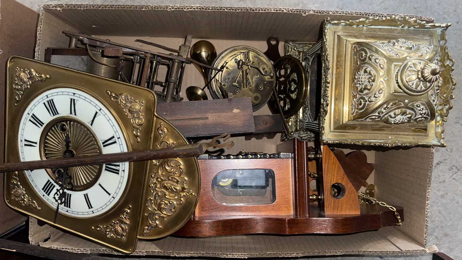 Lot 684 - A collection of antique clock elements, to