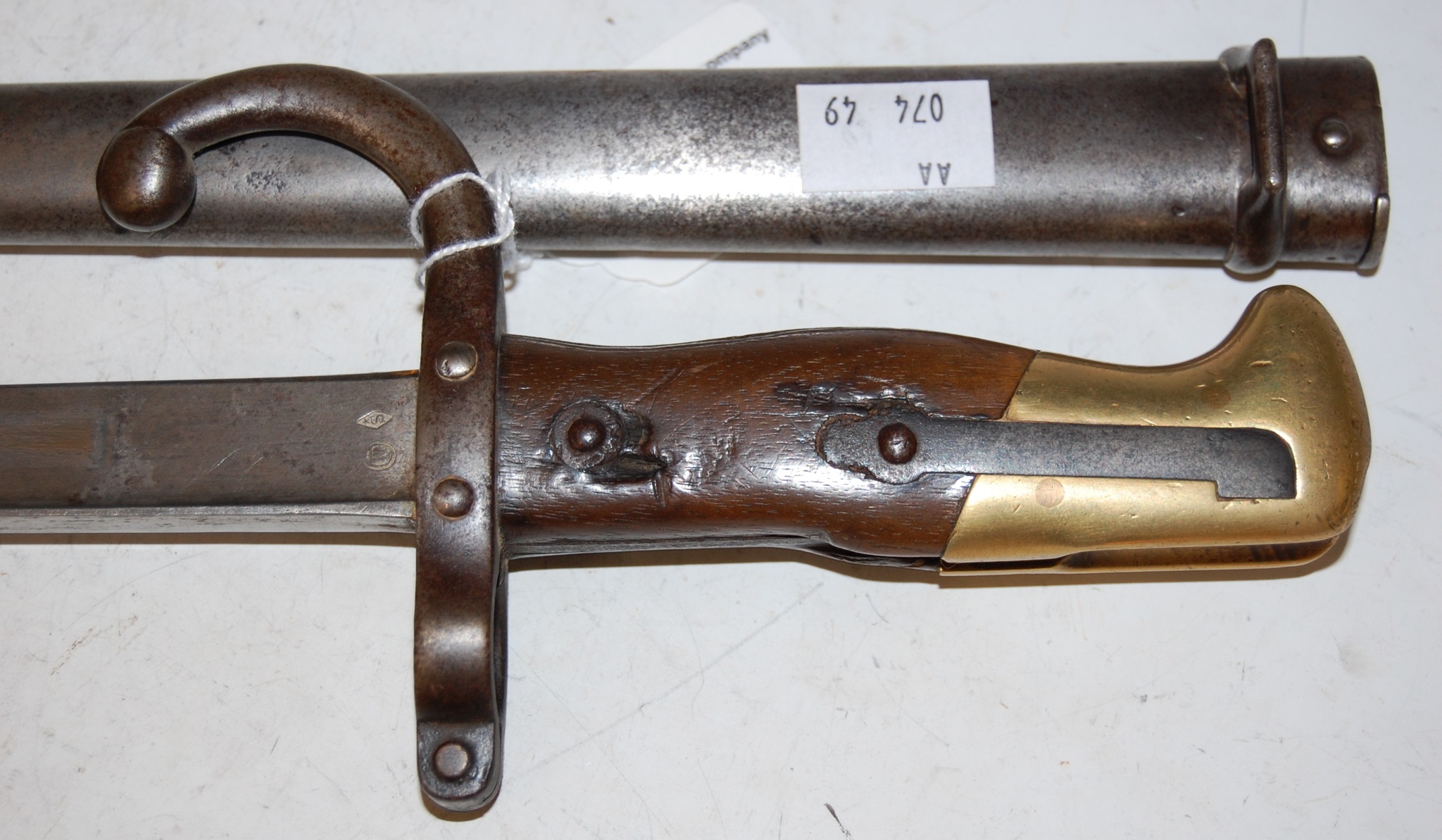 Lot 81 - A late 19th century French Bayonet, inscribed