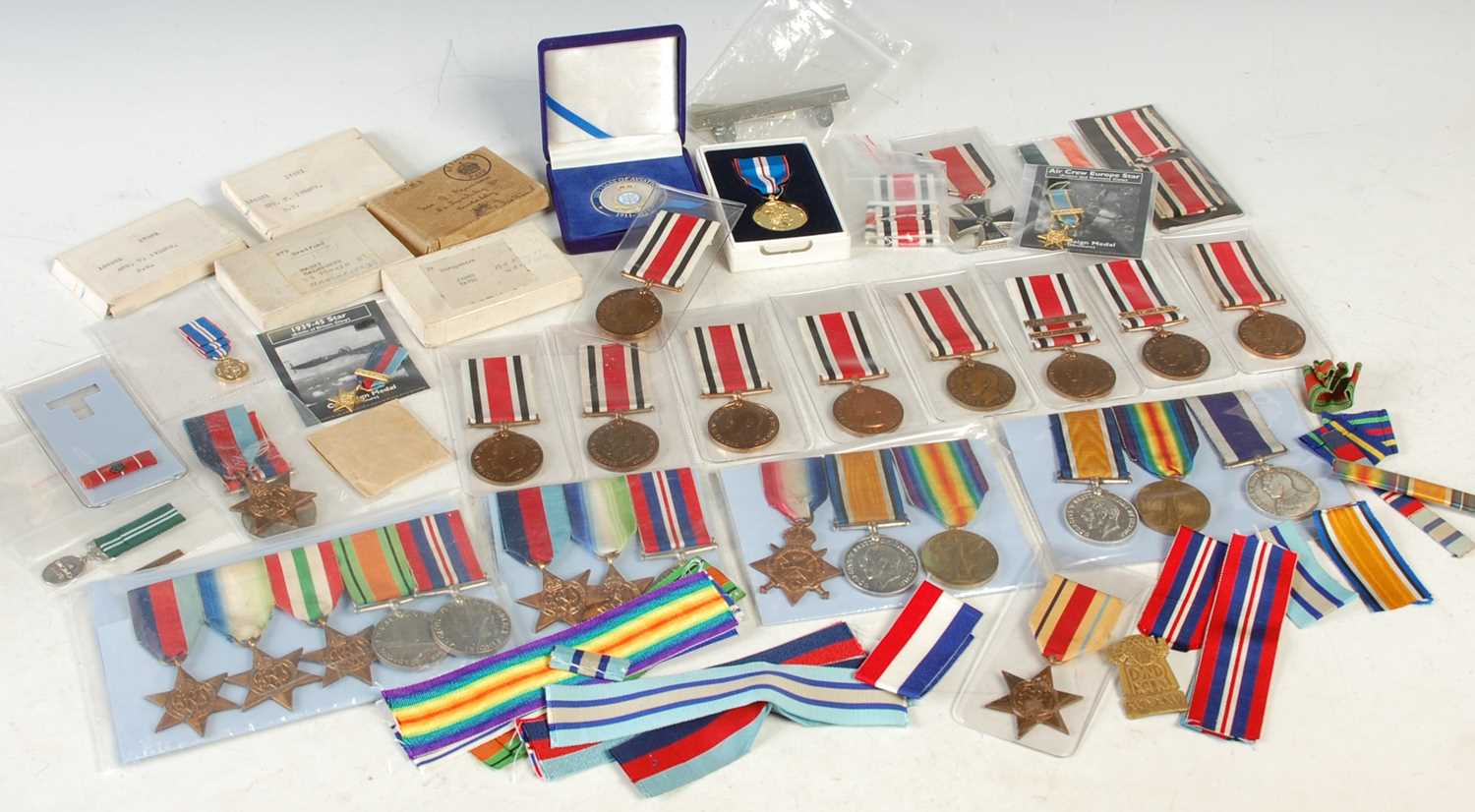 Lot 254 - A collection of assorted Great War, WWII and