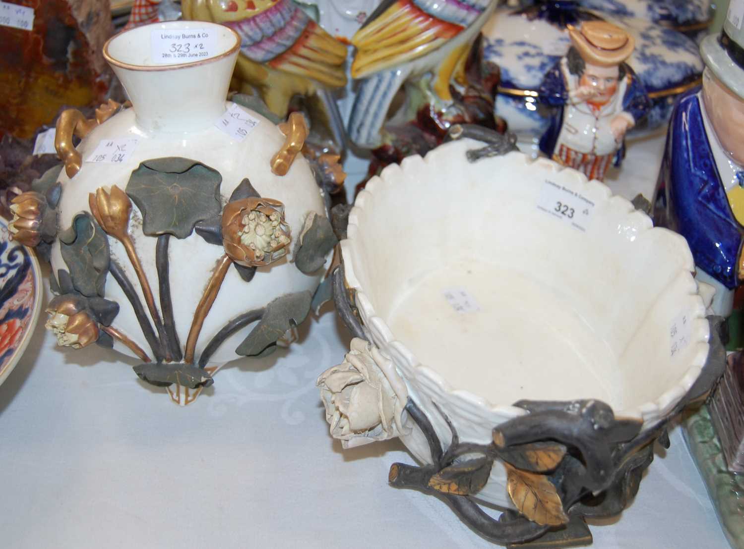 Lot 323 - A Moore Pottery floral decorated table