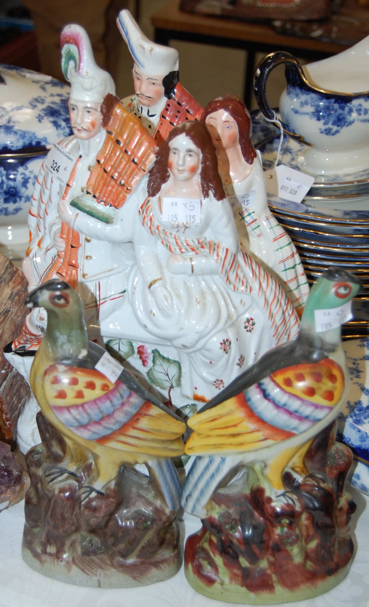 Lot 324 - Two Staffordshire flat-back clock figures