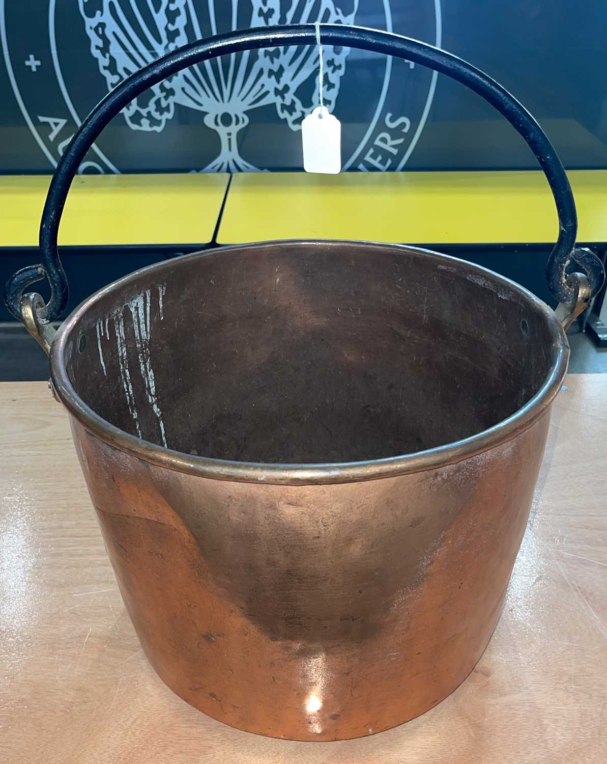 Lot 554 - A copper and brass pail with single hinged