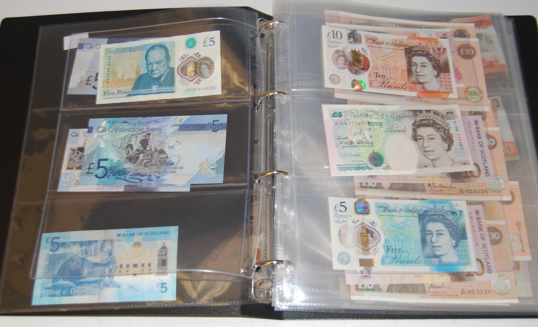 Lot 235 - Banknotes - Two folios of paper banknotes