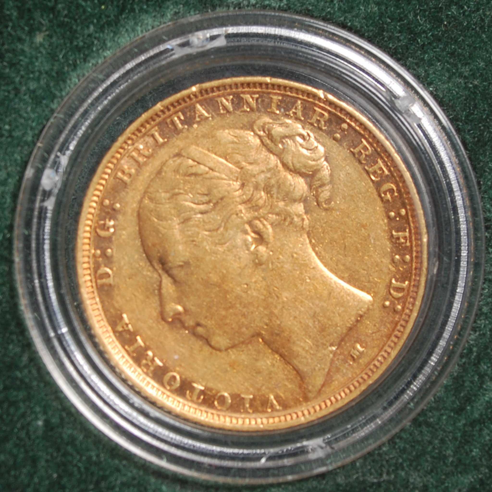 Lot 32 - A Victorian gold sovereign dated 1887 in