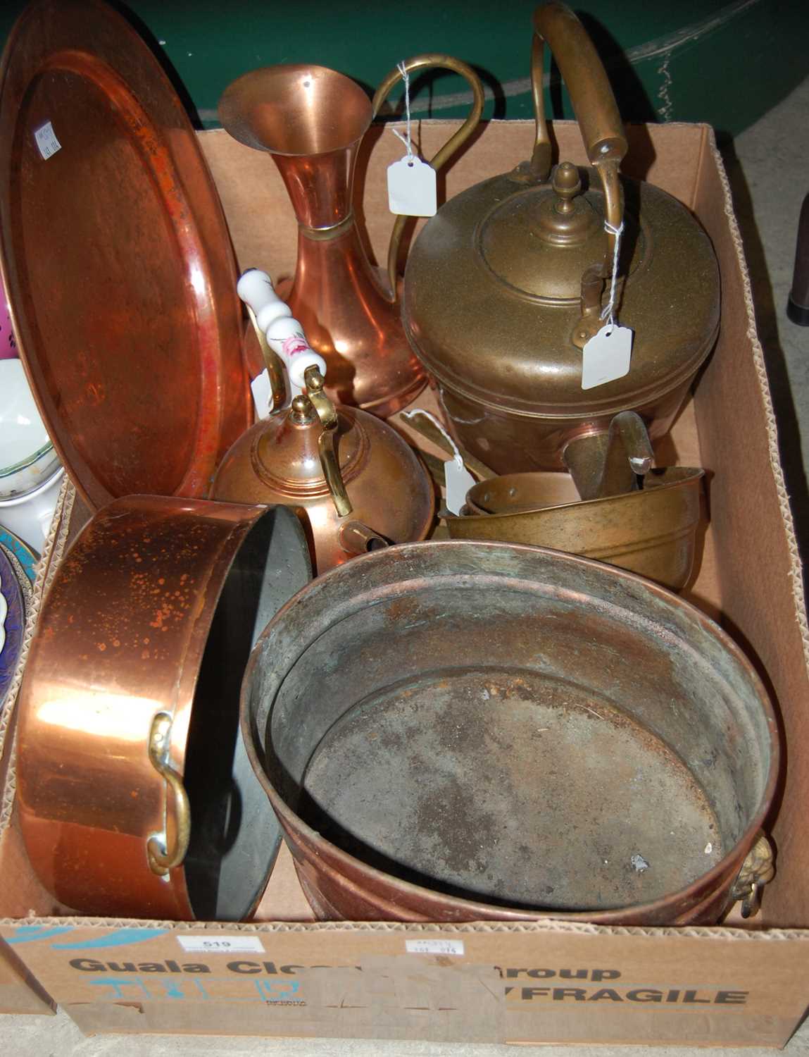 Lot 519 - A box of mixed copper ware