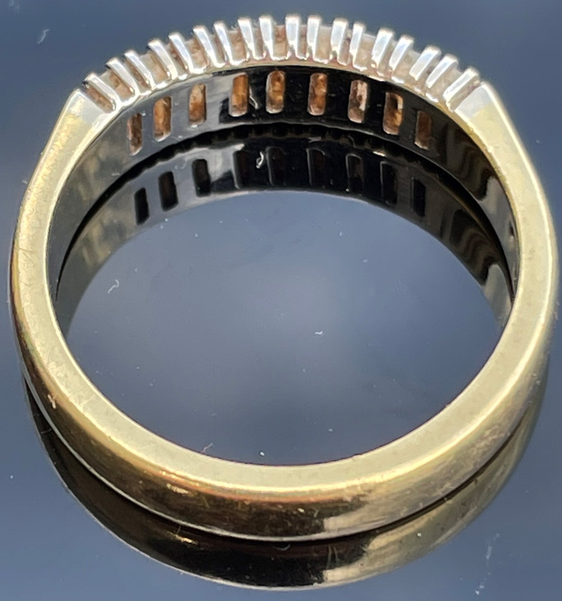 Lot 221 - An 18ct gold and nine stone diamond set ring,