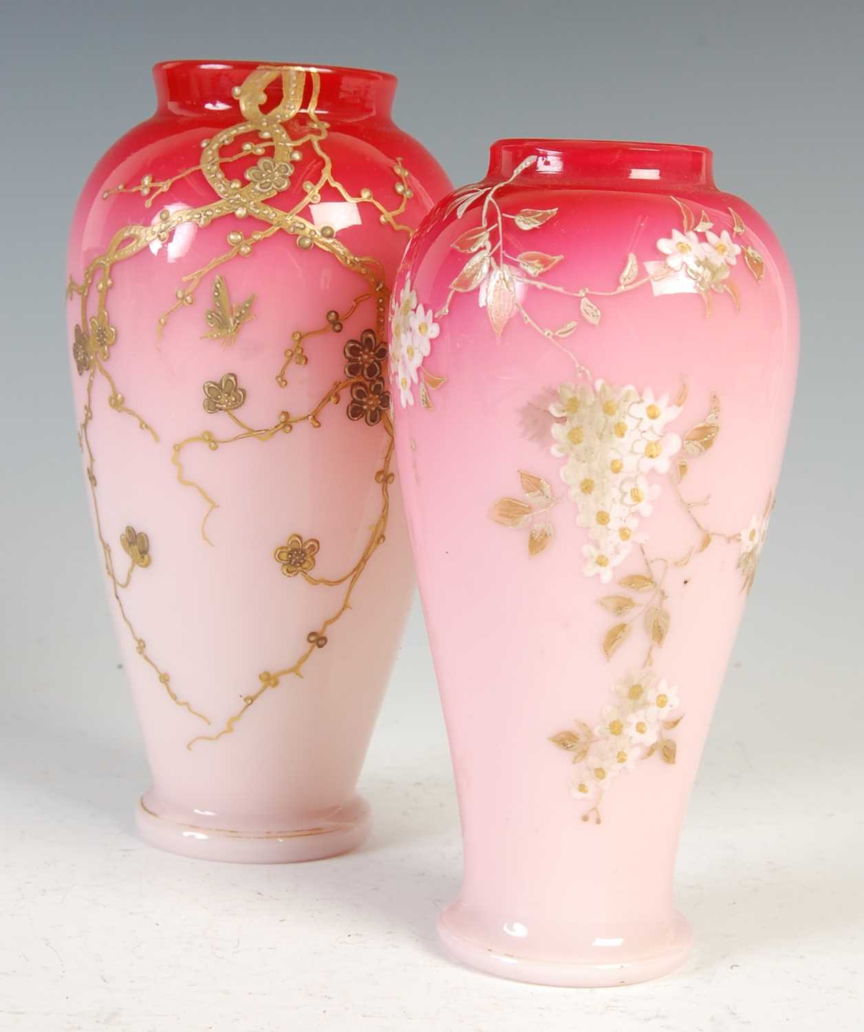 Lot 535 - Two late 19th century peach blow glass vases,