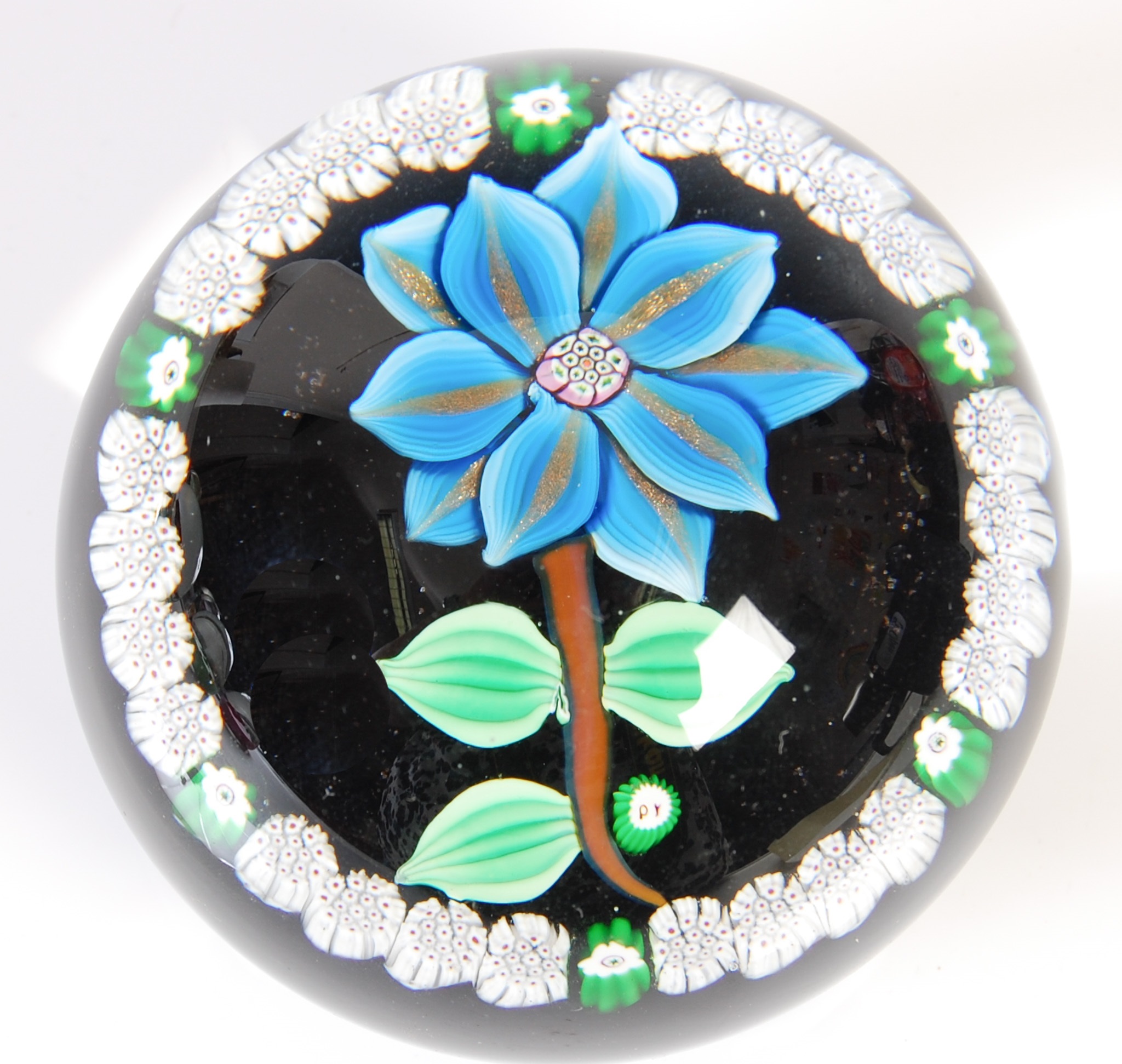 Lot 595 - Two Paul Ysart style paperweights,