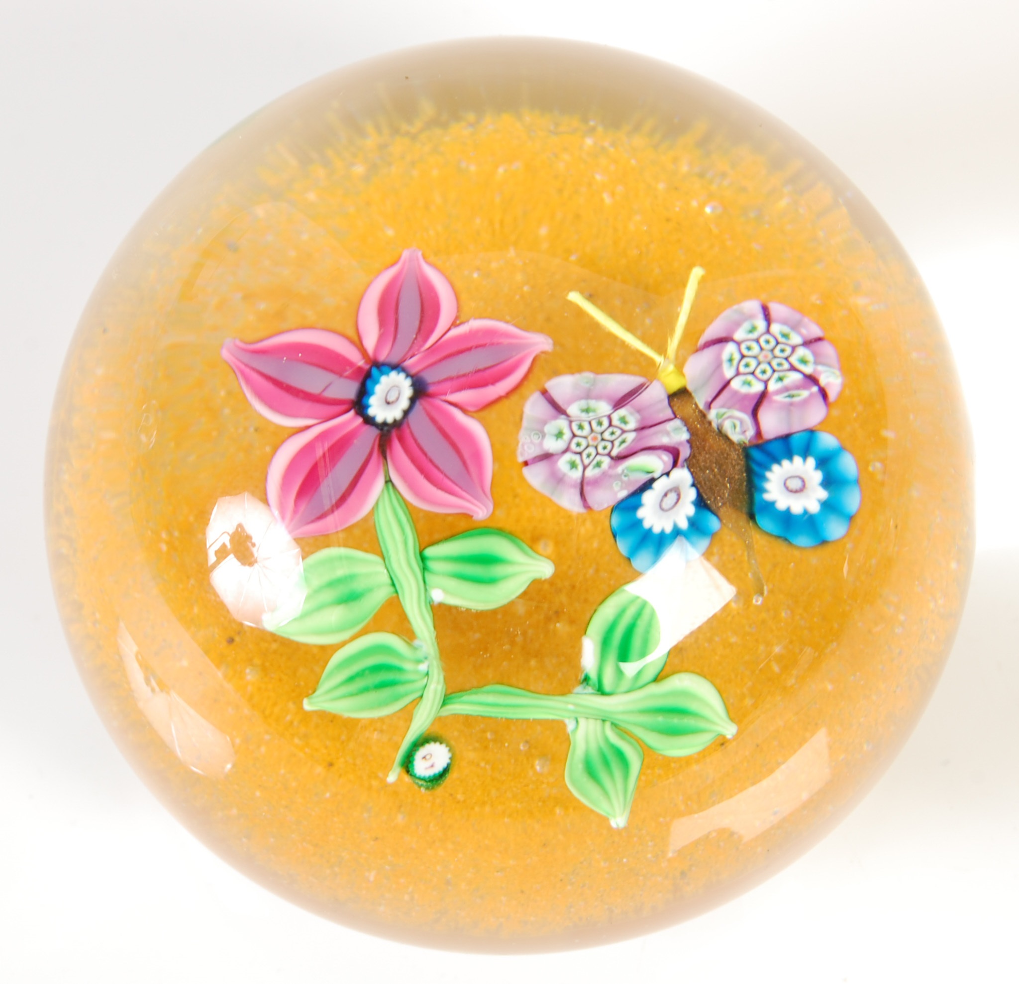 Lot 597 - Two Paul Ysart style paperweights,