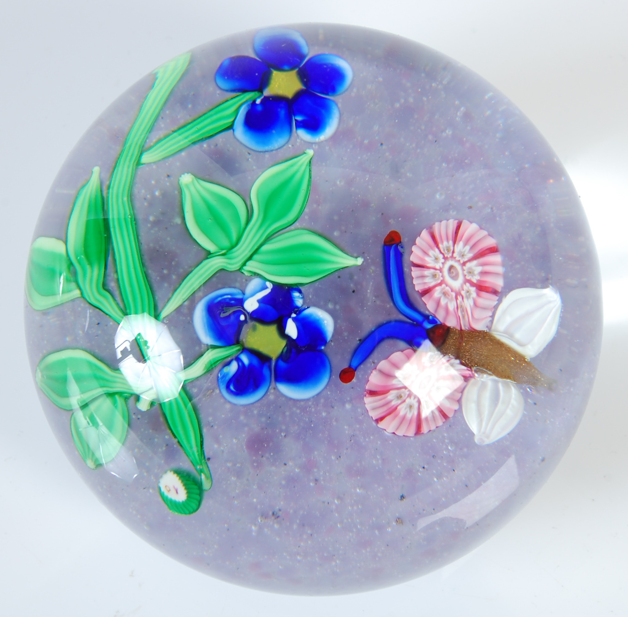 Lot 597 - Two Paul Ysart style paperweights,