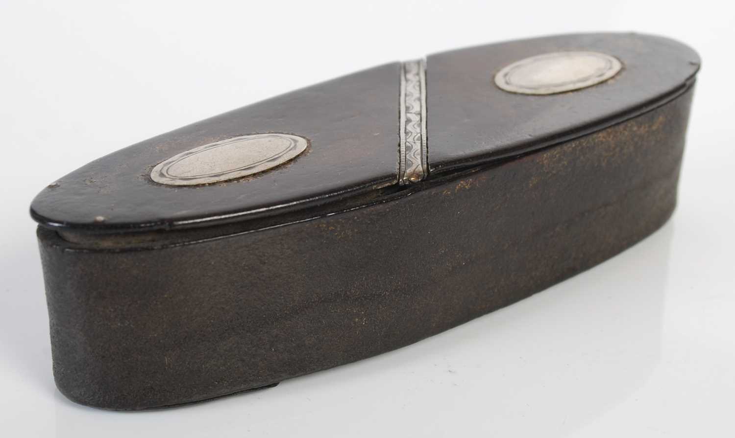 Lot 258 - A leather two-compartment oval snuff box,