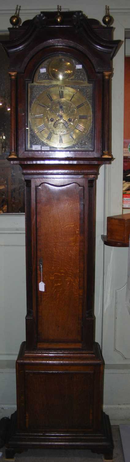 Lot 857 - A late 18th/ 19th century oak longcase clock,