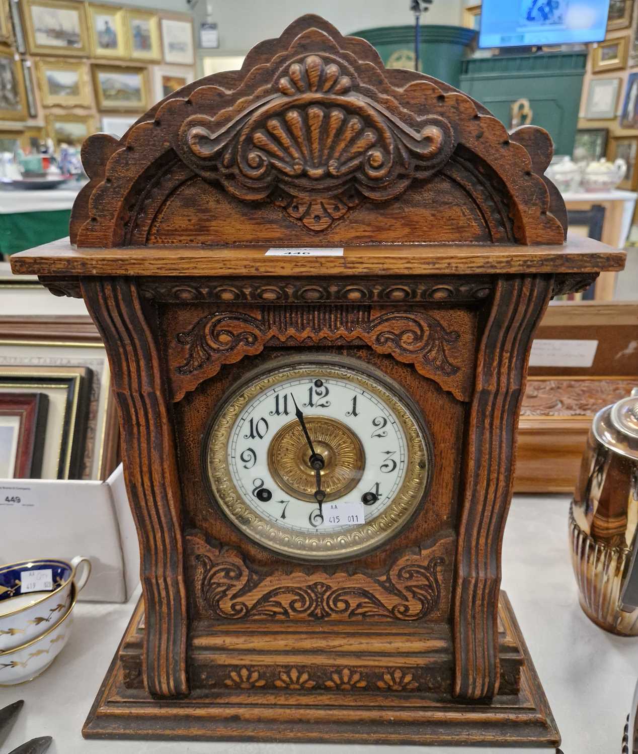 Lot 446 - An Ansonia oak cased mantle clock with
