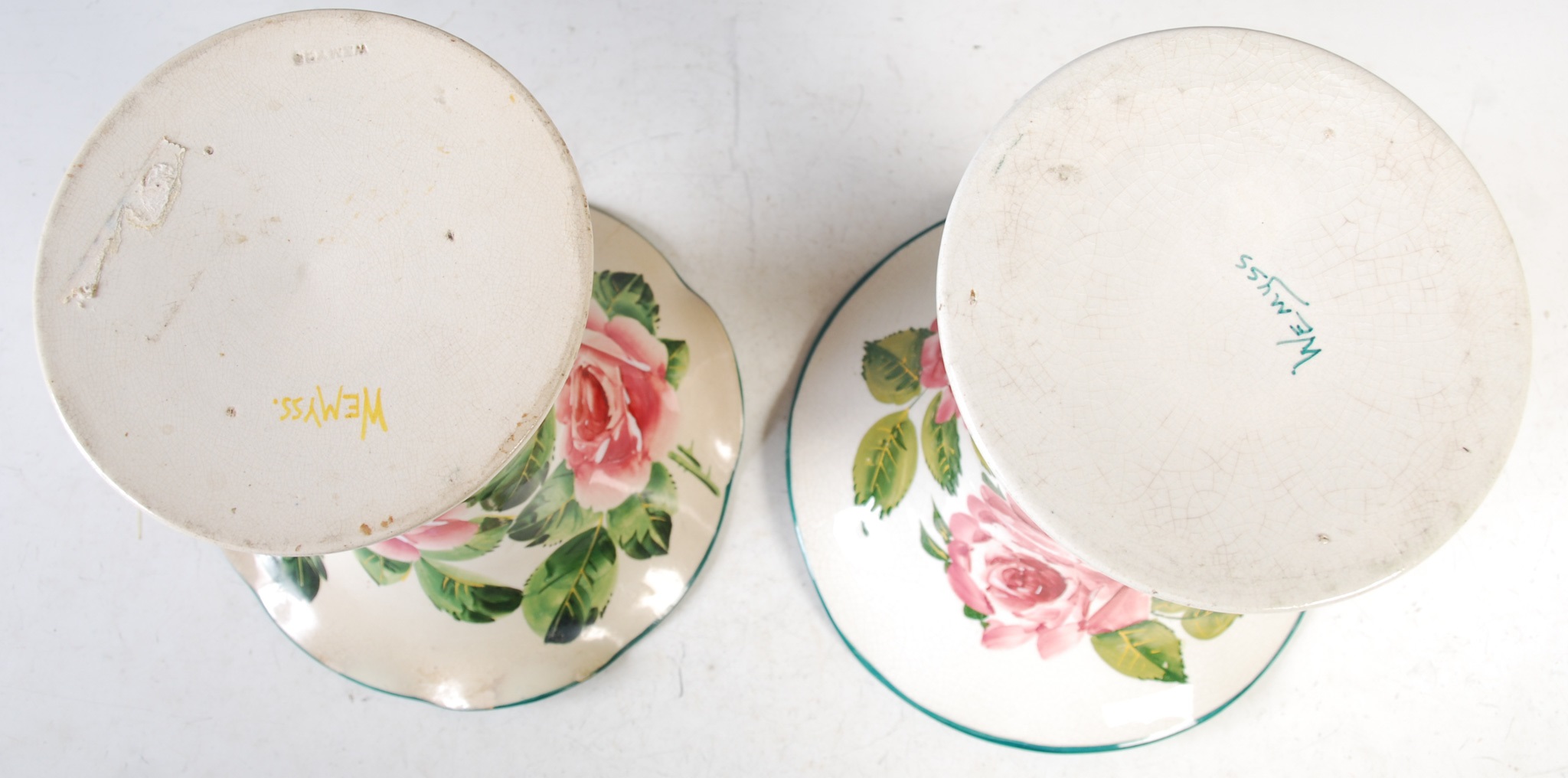 Lot 250 - A pair of Wemyss Pottery Lady Eva vases,