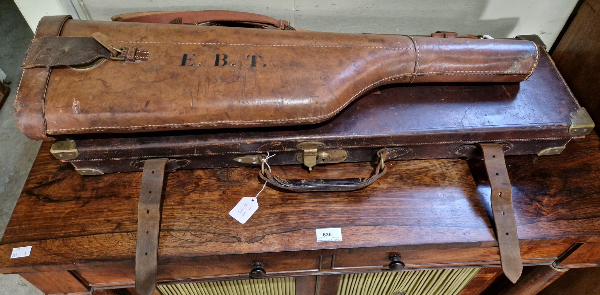 Lot 639 - An antique leather gun case, the underside