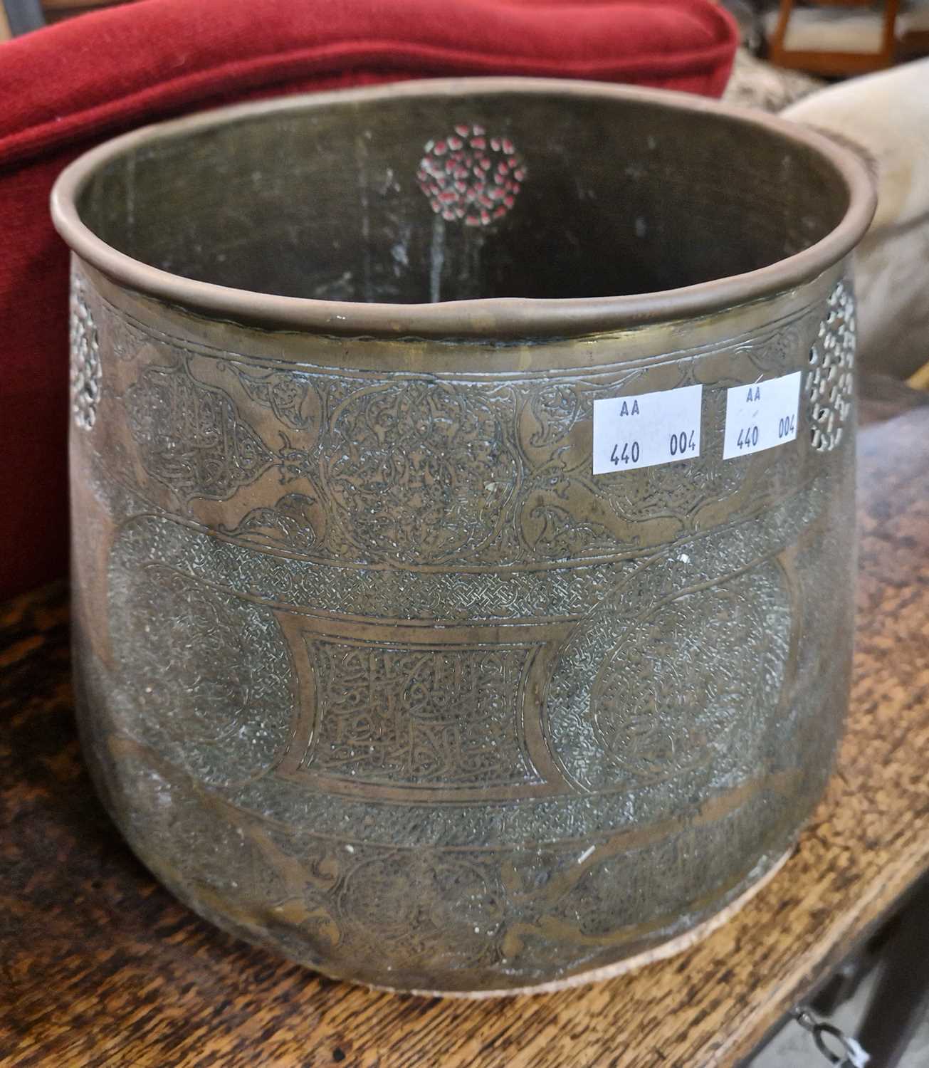 Lot 397 - An antique Cairo Ware brass planter of