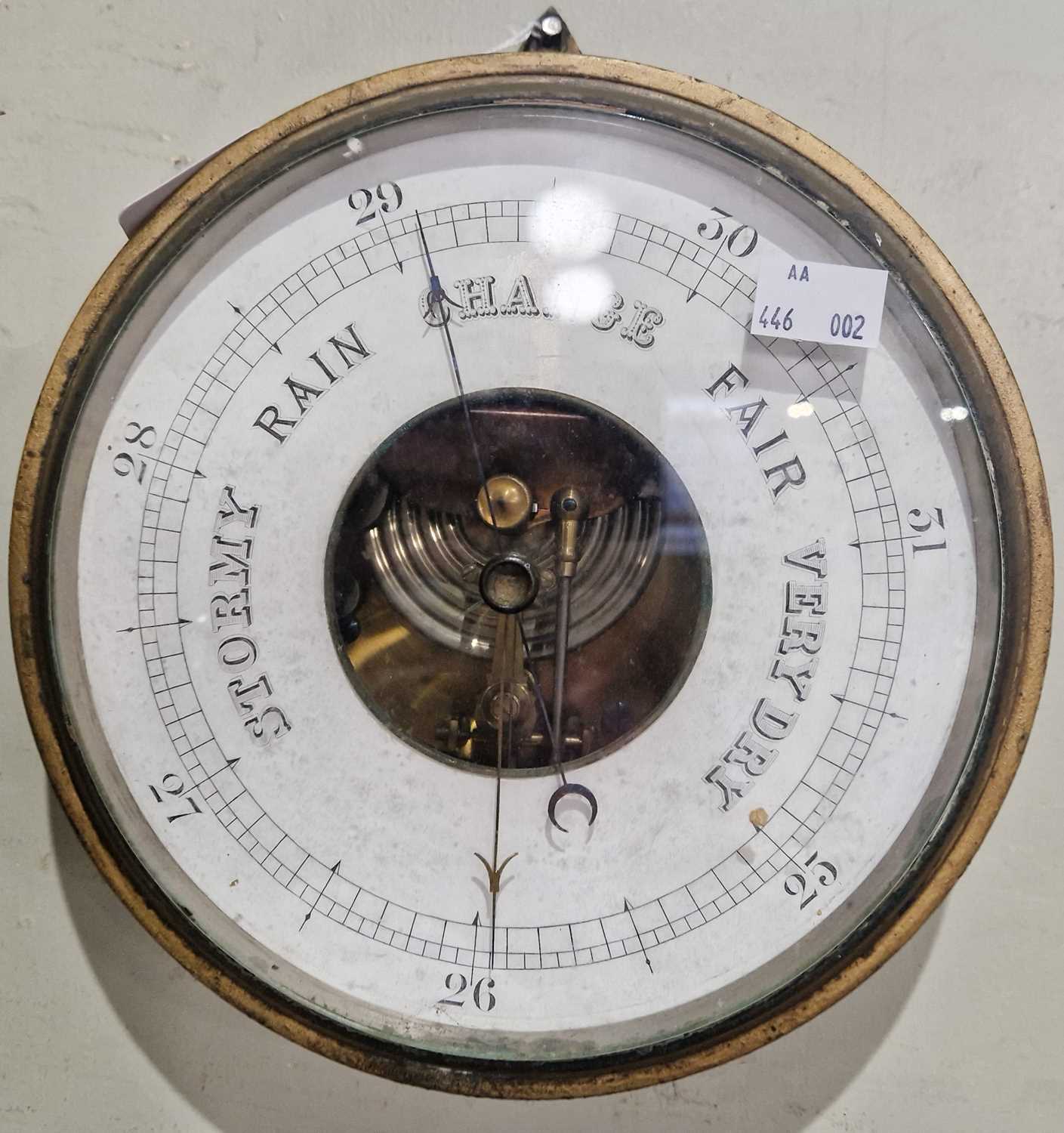 Lot 477 - A 19th century circular wall barometer with