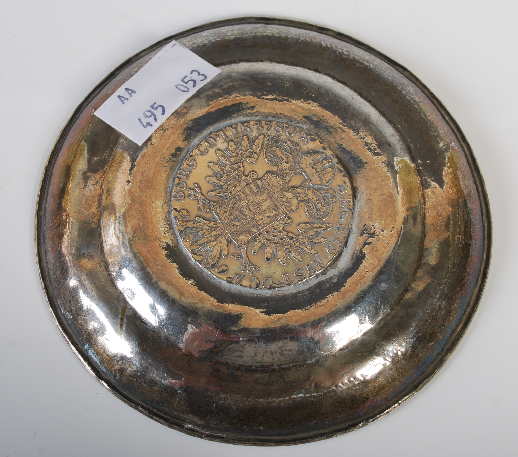 Lot 126 - A white metal coin-set dish, 10cm diameter,