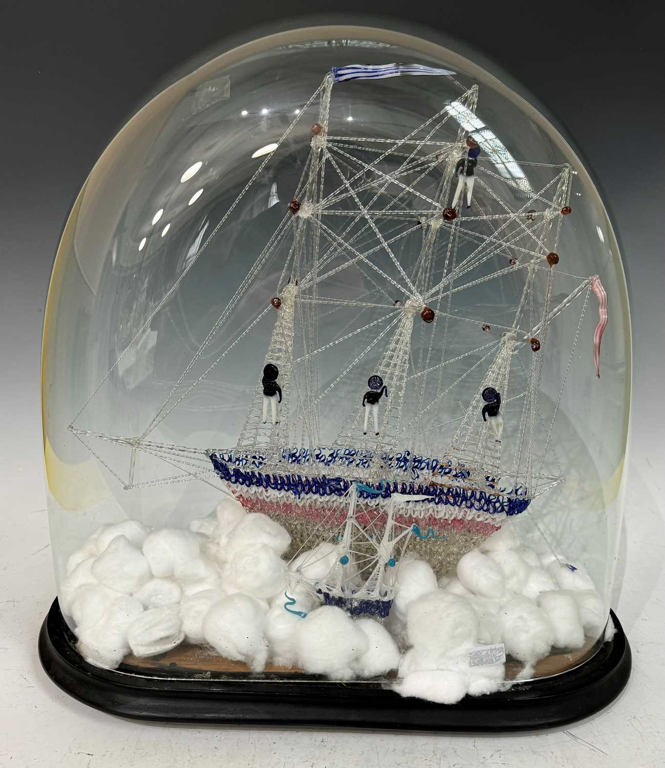 Lot 504 - An antique spun glass frigger, in the form