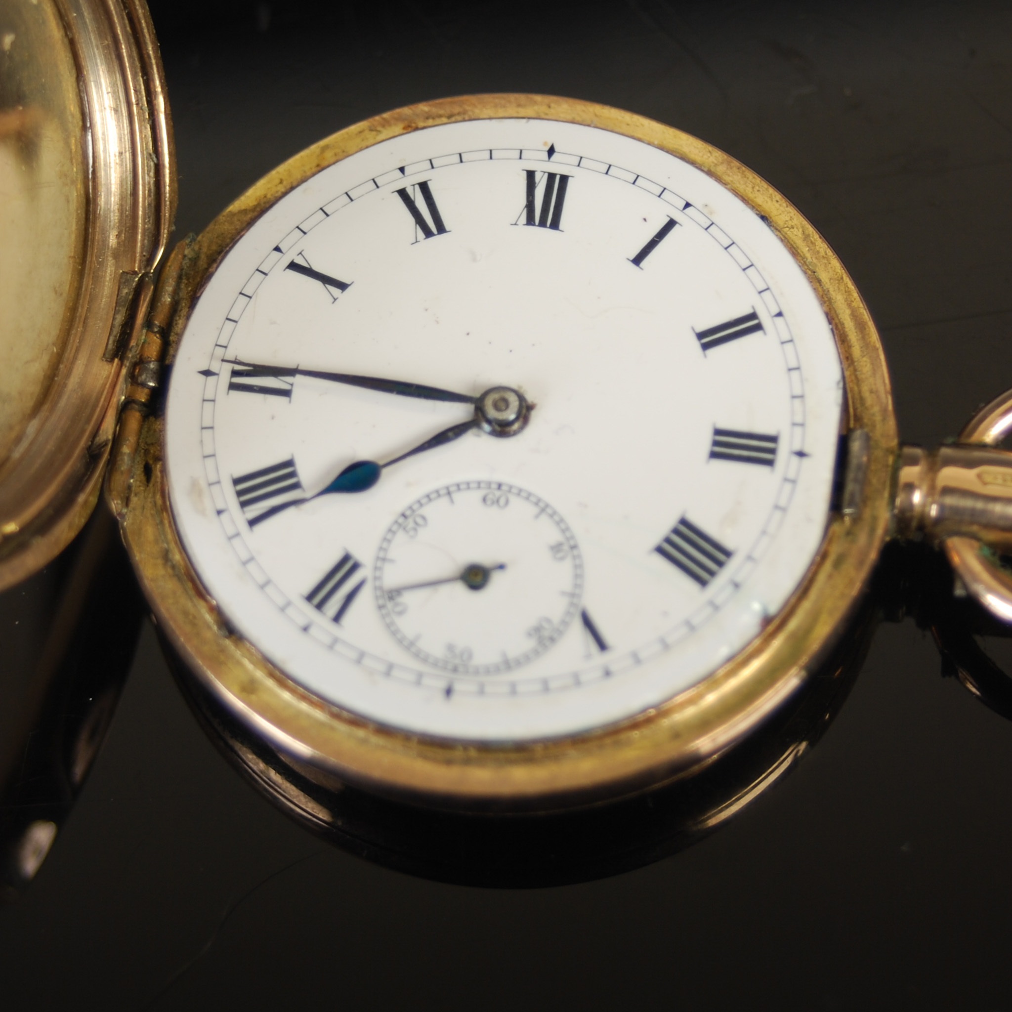 Lot 447 - A 9ct gold hunter cased pocket watch, the