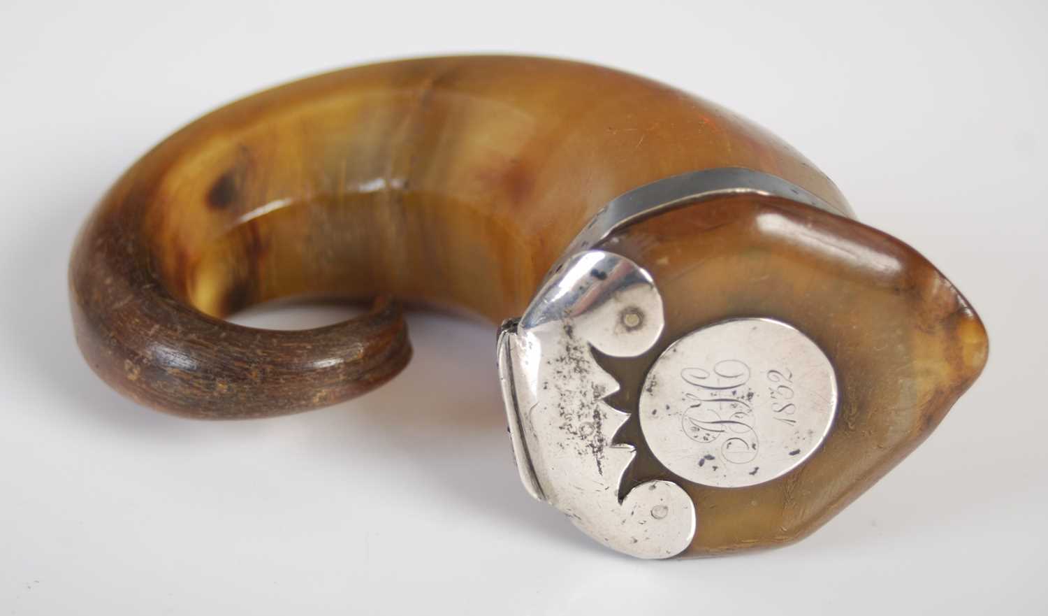 Lot 257 - A Scottish blonde curly horn snuff mull with