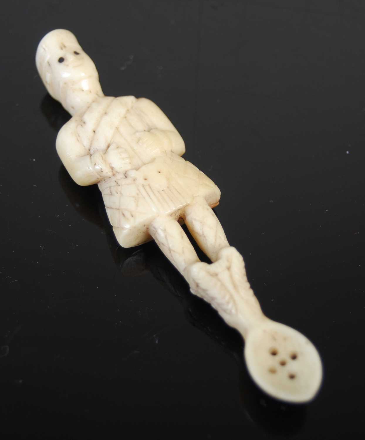 Lot 309 - A rare Scottish bone snuff spoon carved in
