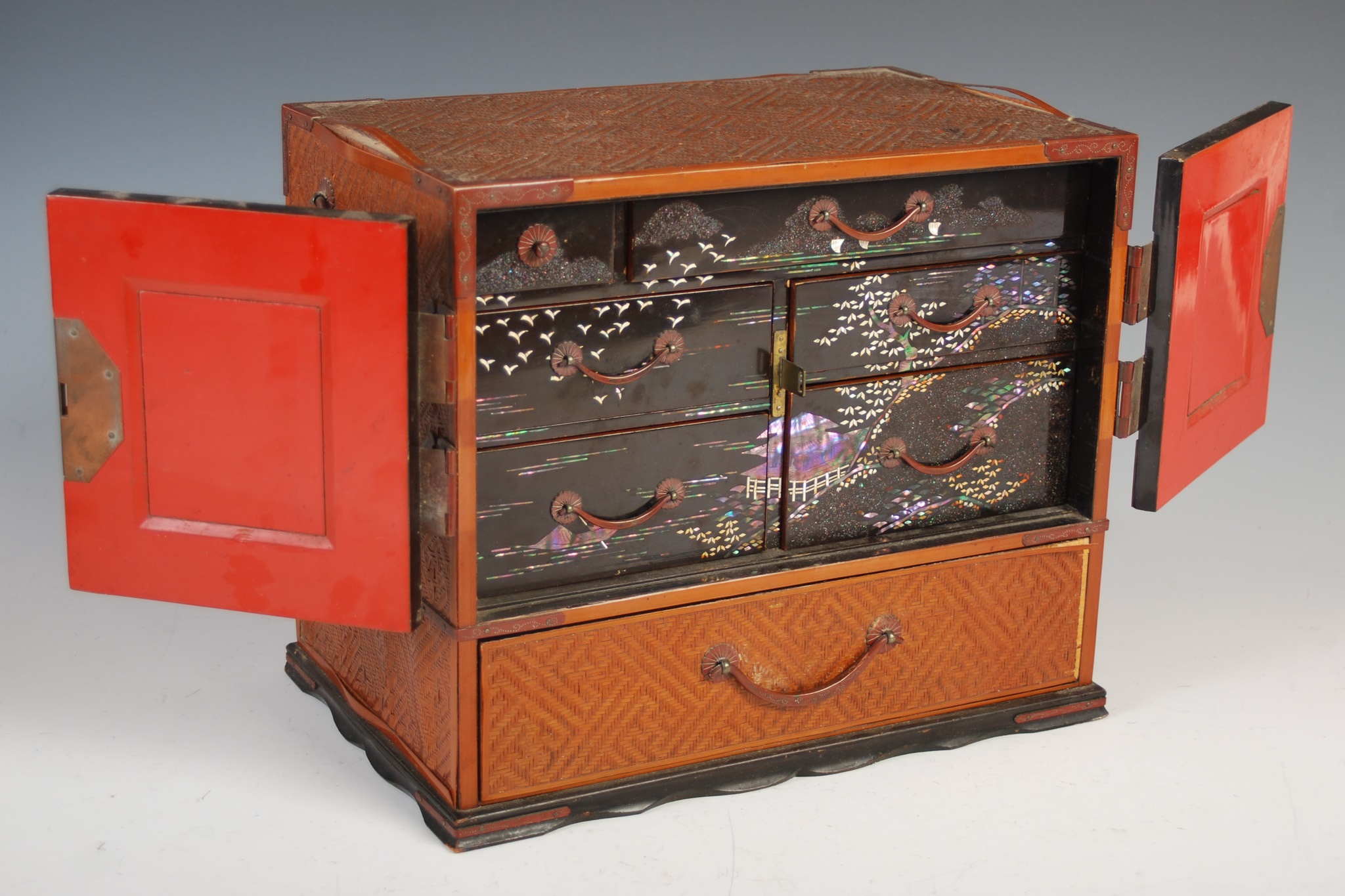 Lot 611 - A Japanese lacquer jewellery cabinet with