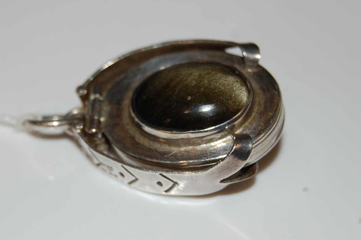 Lot 44 - Ari D. Norman, a silver and cabochon set